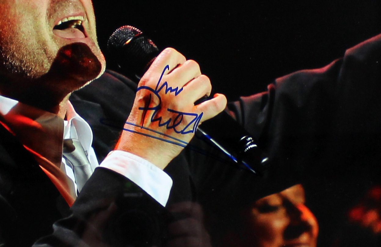 Phil Collins Signed Framed 16×20 Photo – Arm In the Air with Microphone ...